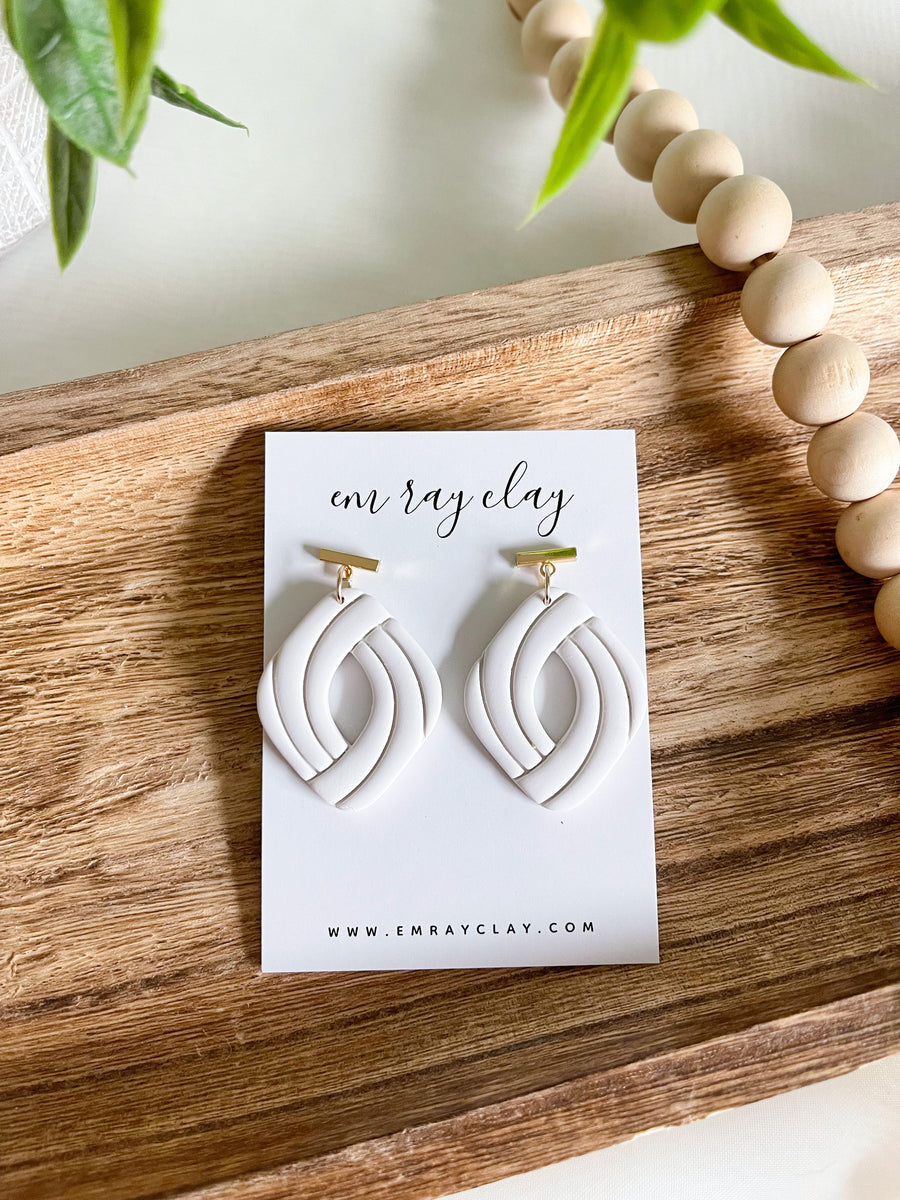 Embossed Dangles – Em Ray Clay
